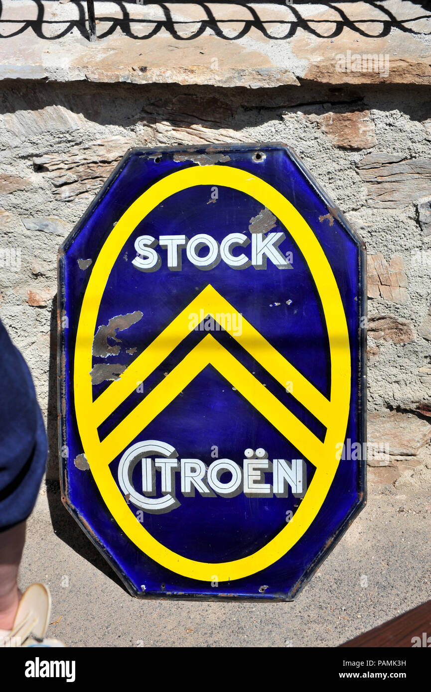 French metal advertising sign in french market Stock Photo - Alamy