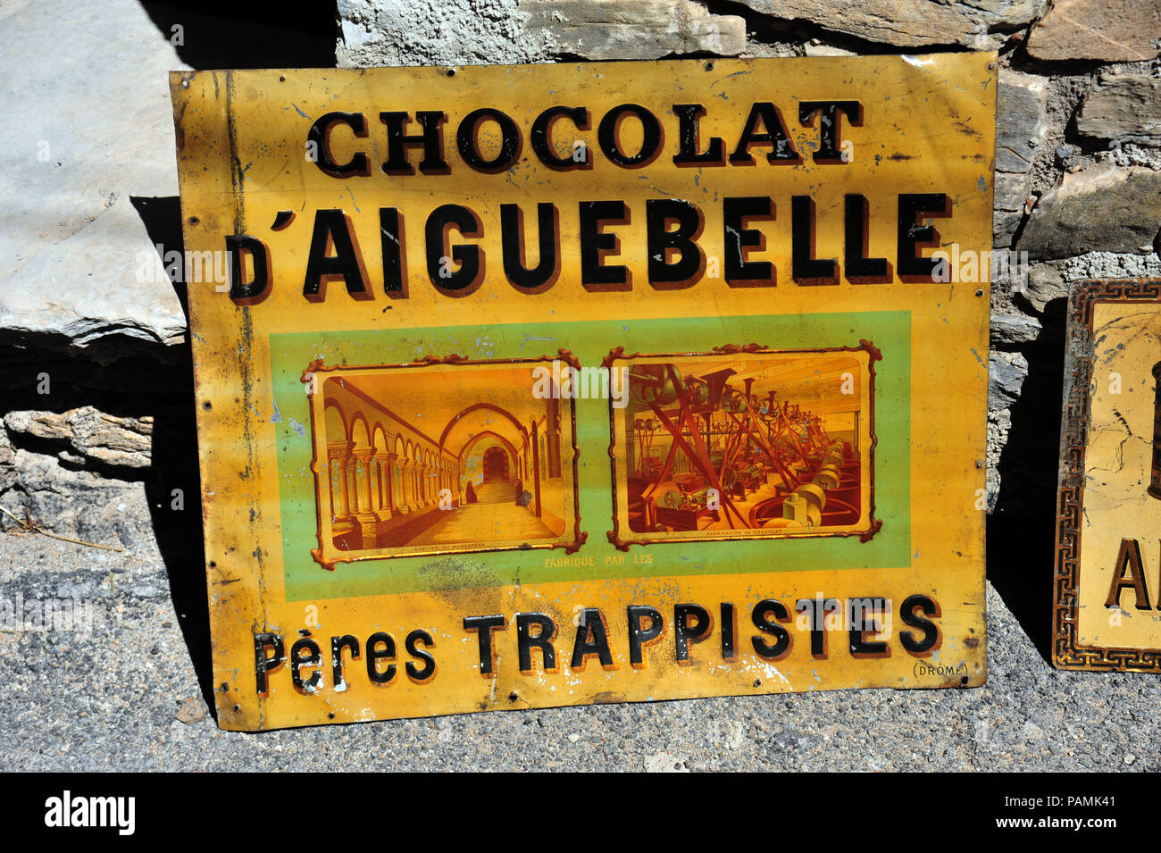 French metal advertising sign in french market Stock Photo - Alamy