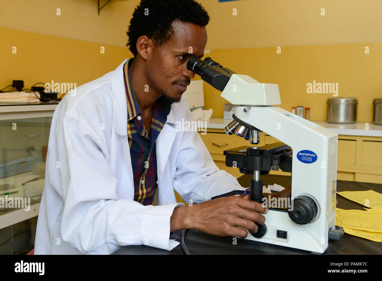 ETHIOPIA Taza Catholic Health Center , laboratory, microscope, checking ...