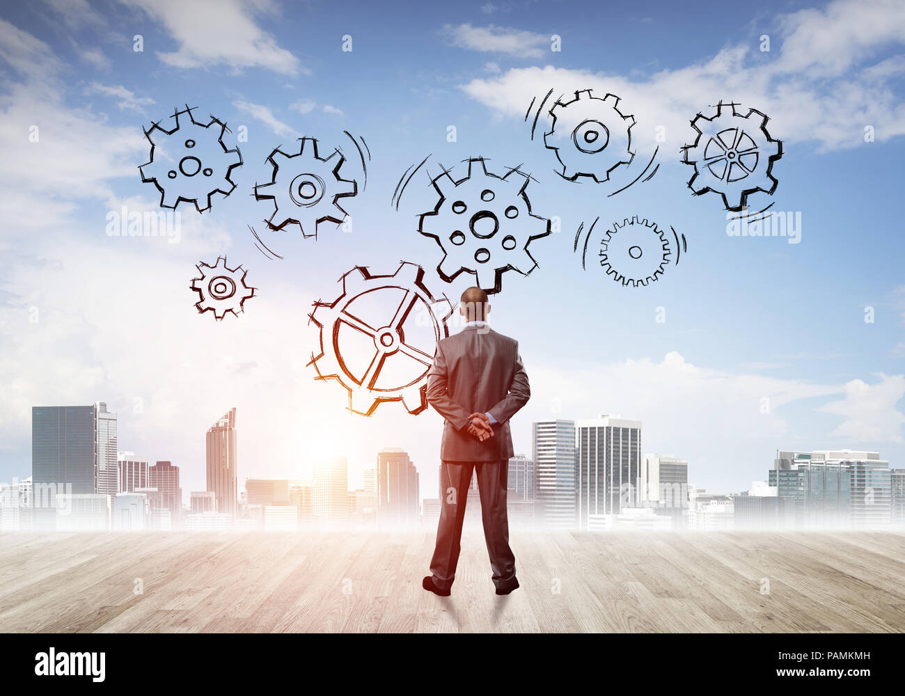 Cogwheel engine drawn on screen as symbol for teamwork and cooperation ...