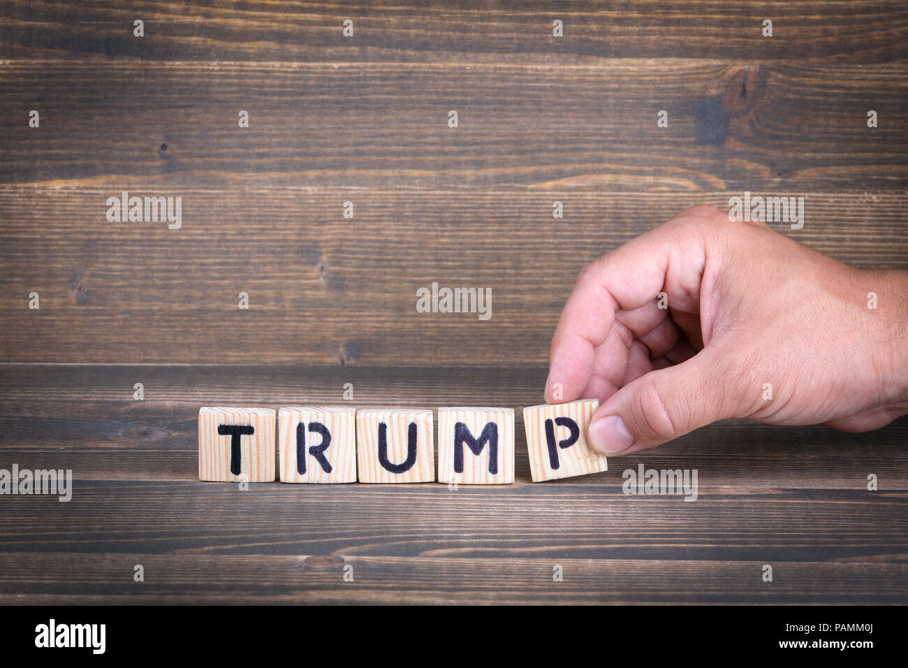 Trump. Text from wooden letters on the office desk Stock Photo - Alamy