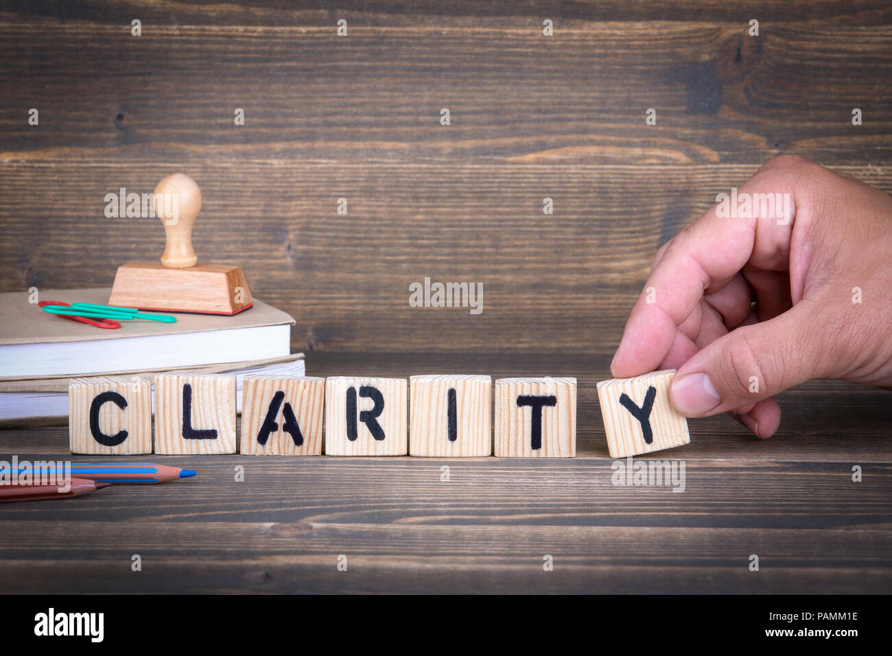 Clarity. Wooden letters on the office desk Stock Photo - Alamy