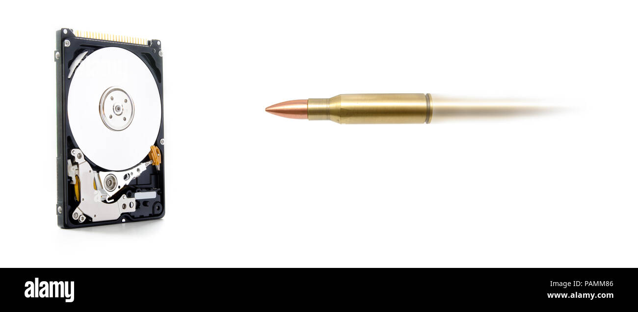Bullet fiering twards a hard drive destroying data Stock Photo - Alamy