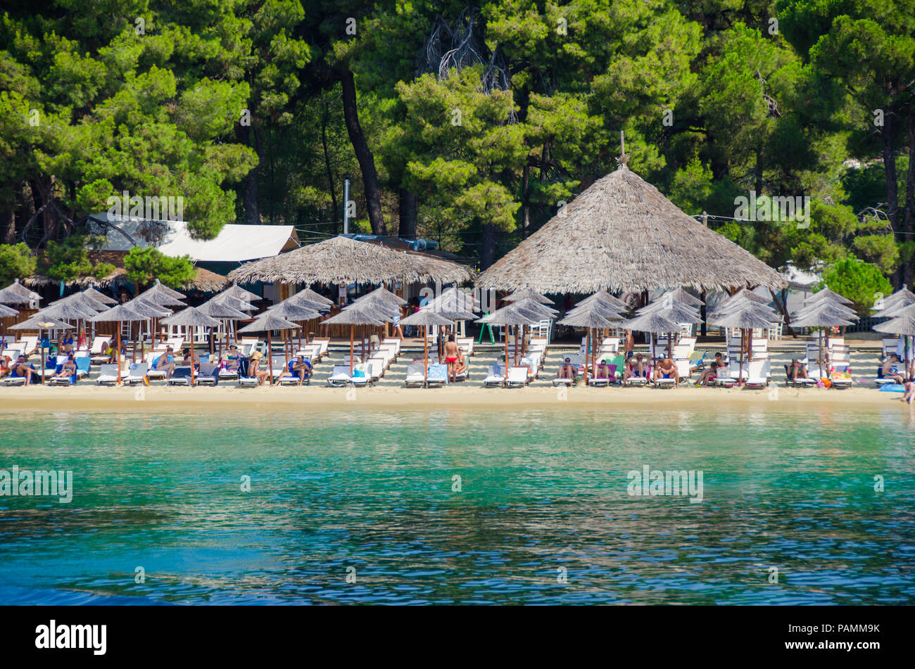 Beach view with a tropical blue water Stock Photo - Alamy