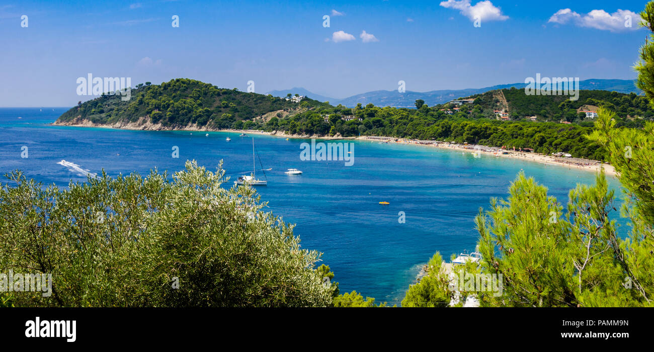 Tropical blue water bay on an exotic island Stock Photo - Alamy