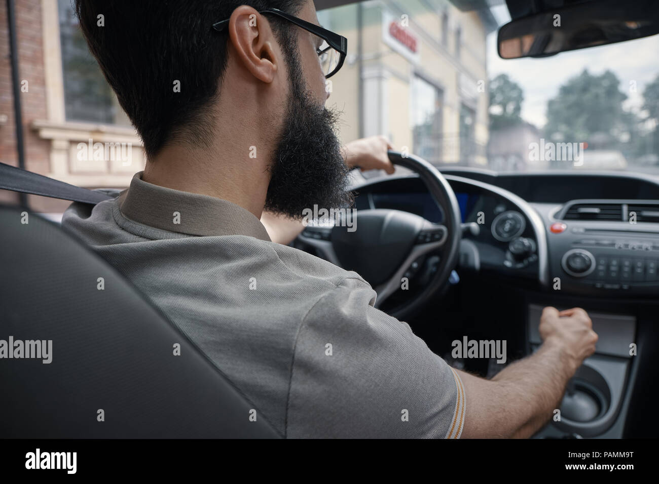 Man Driving Car Side View