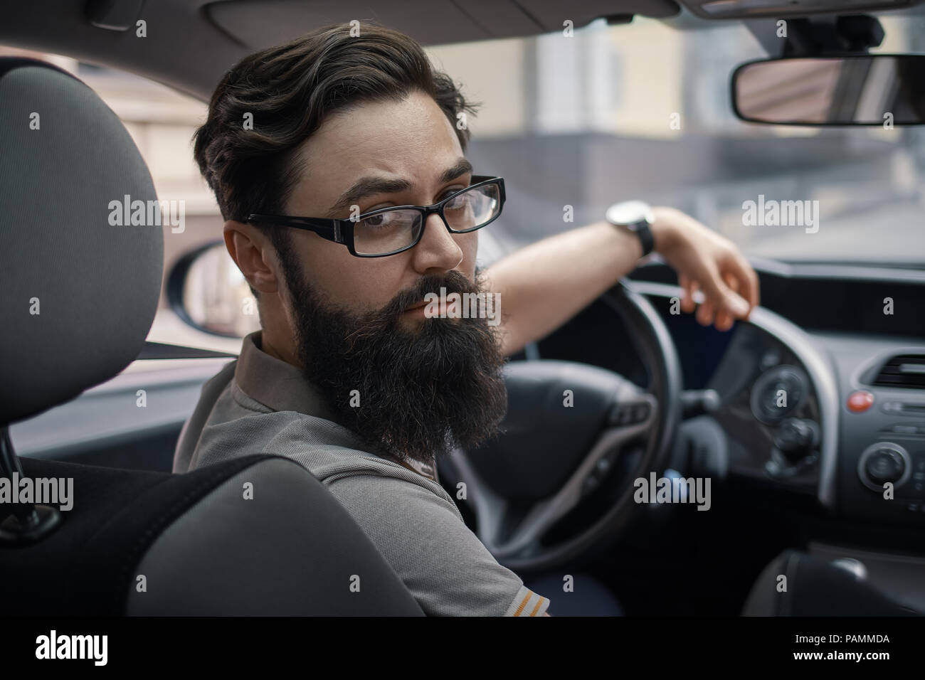 Driver man paying attention to road Stock Photo - Alamy