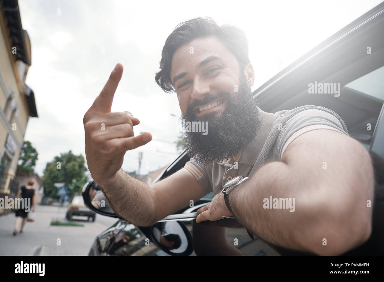 Happy man driving car hi-res stock photography and images - Alamy