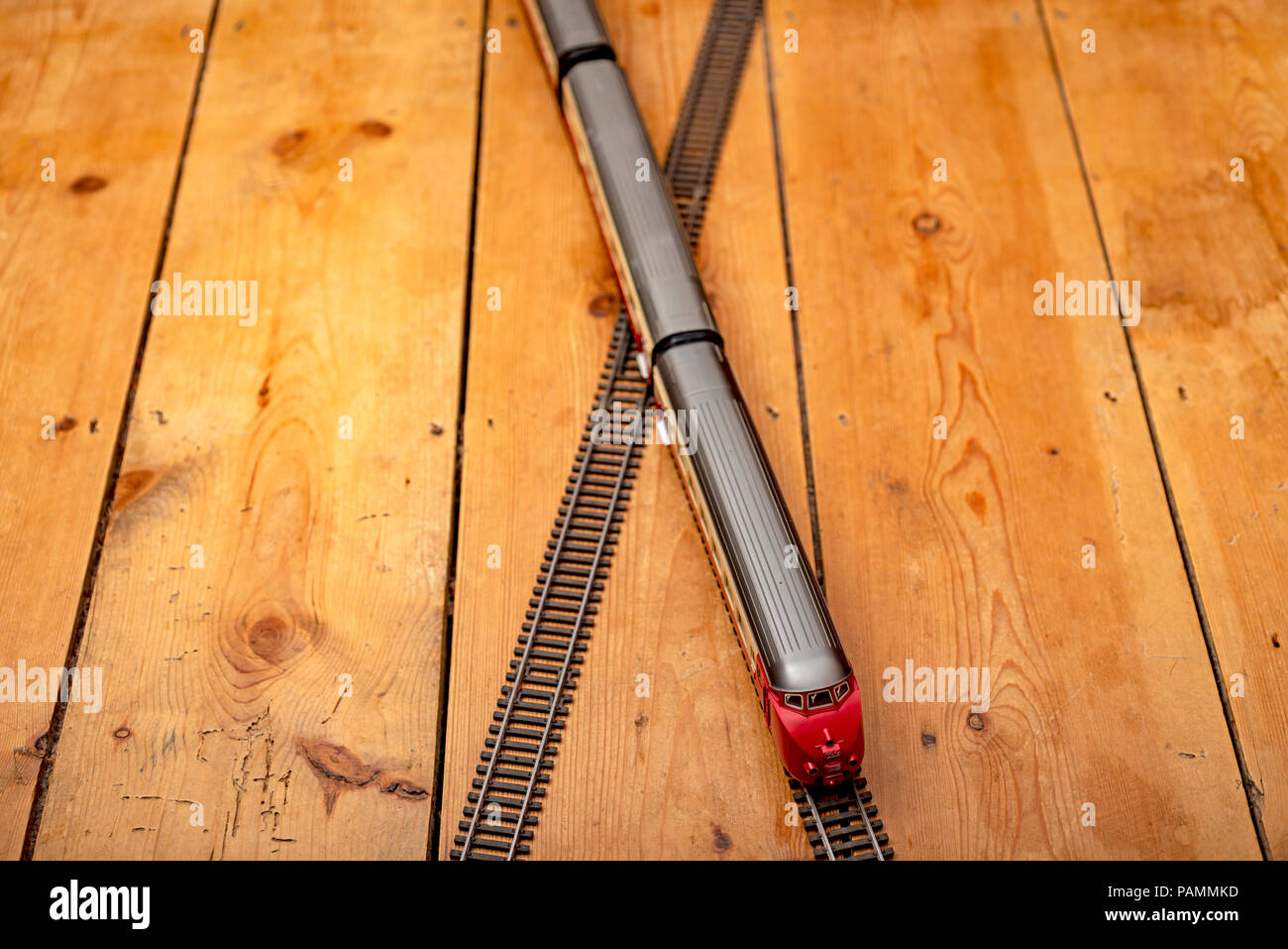 Toy train set on living room floor Stock Photo - Alamy