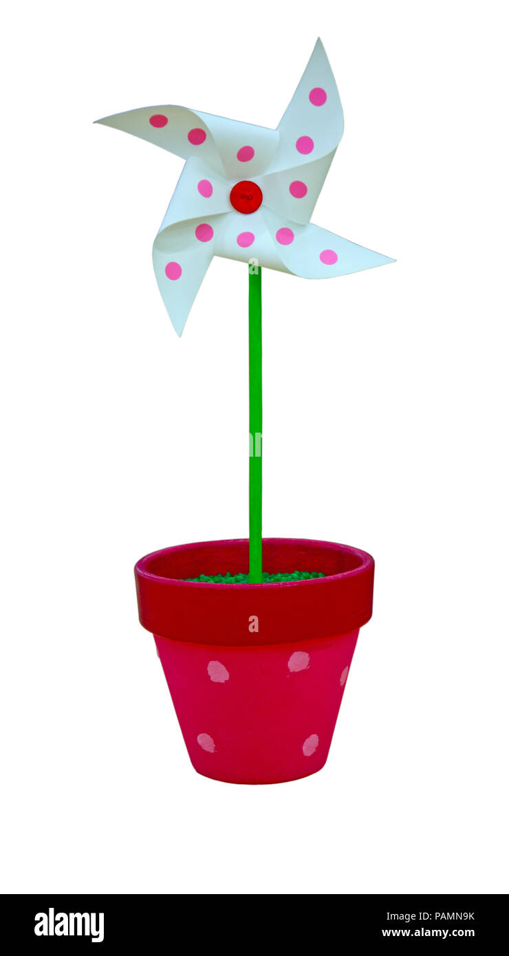 Colored Pinwheel in a Pot, isolated on white Stock Photo - Alamy