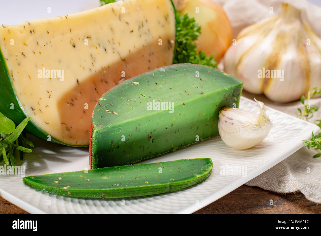 Dutch specialty hard cheese made from cows milk with different spices ...
