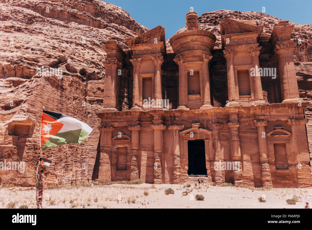 the Jordanian flag flies in front of the Monastery, one of the largest ...