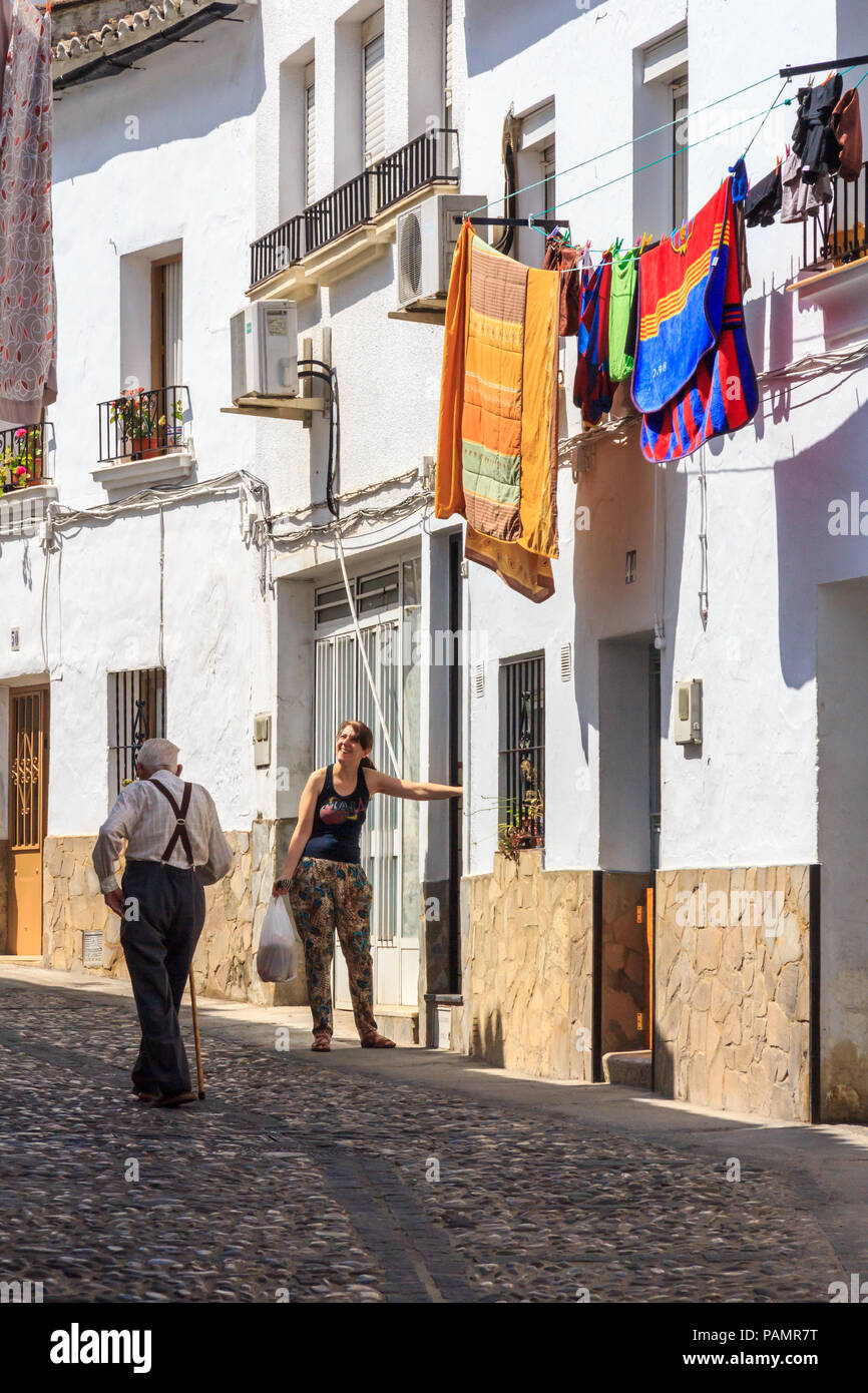 Woman old cobbled street hi-res stock photography and images - Alamy