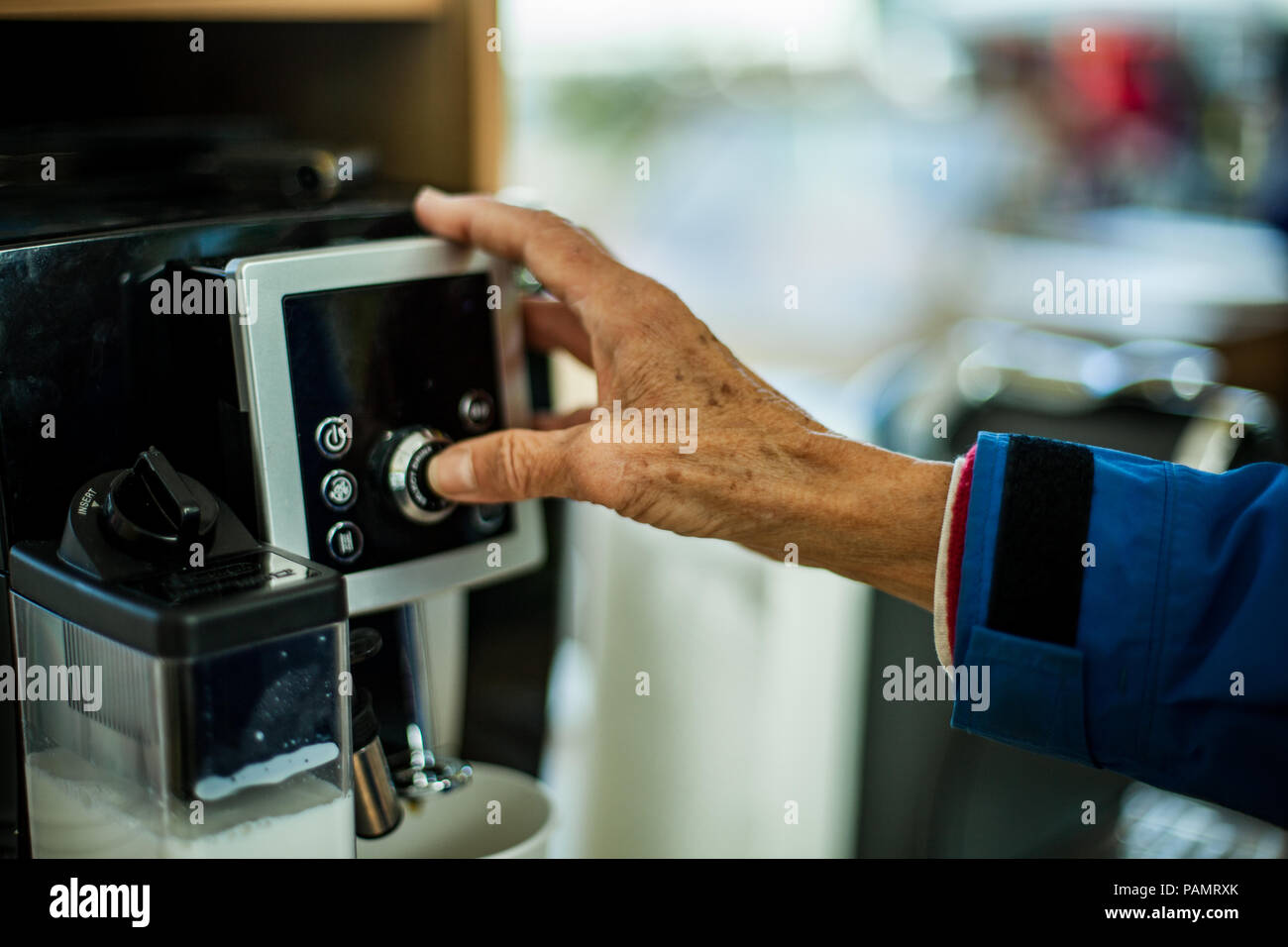 Woman coffee machine button hi-res stock photography and images - Alamy