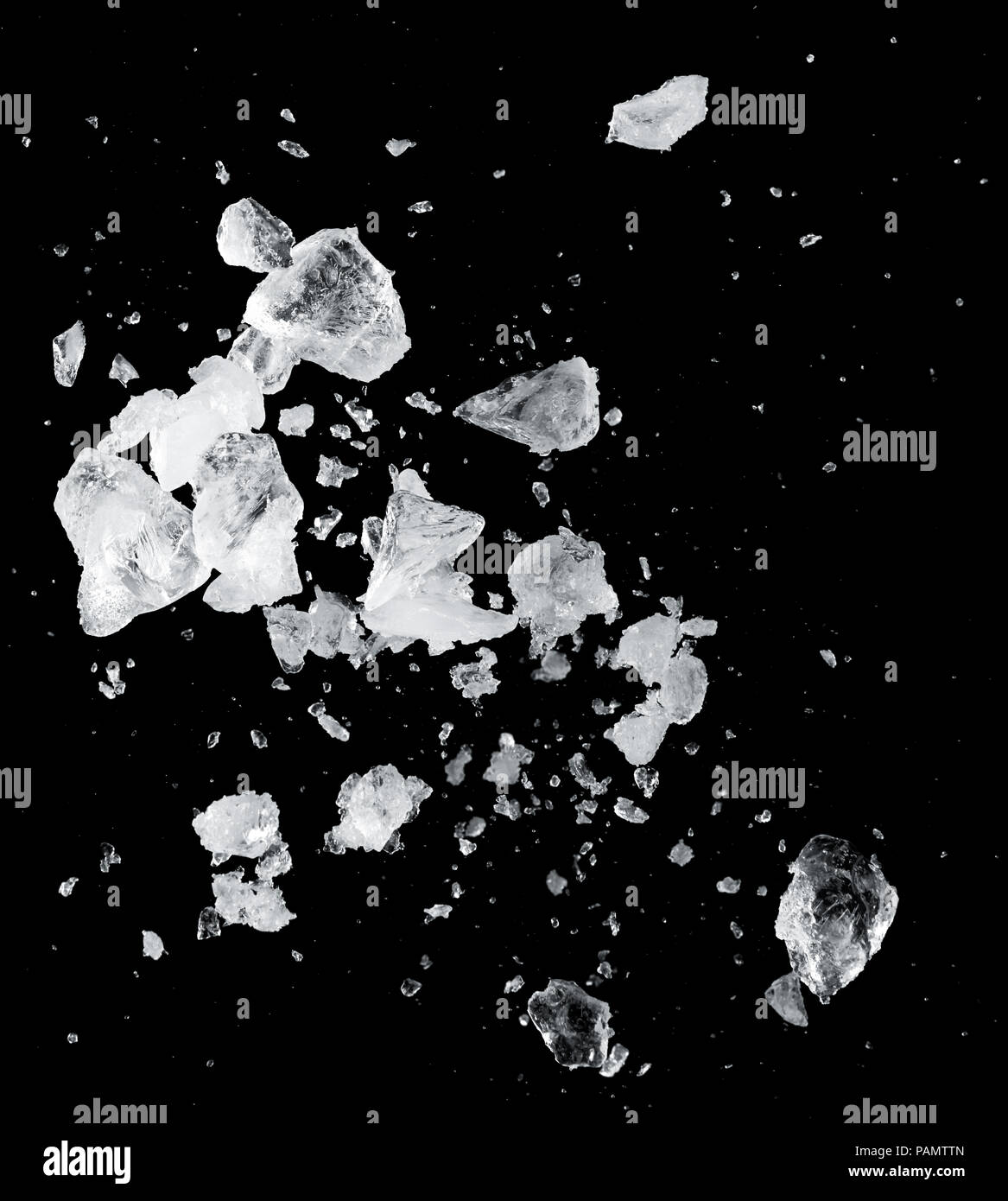 ice blocks splash isolated on black background Stock Photo - Alamy