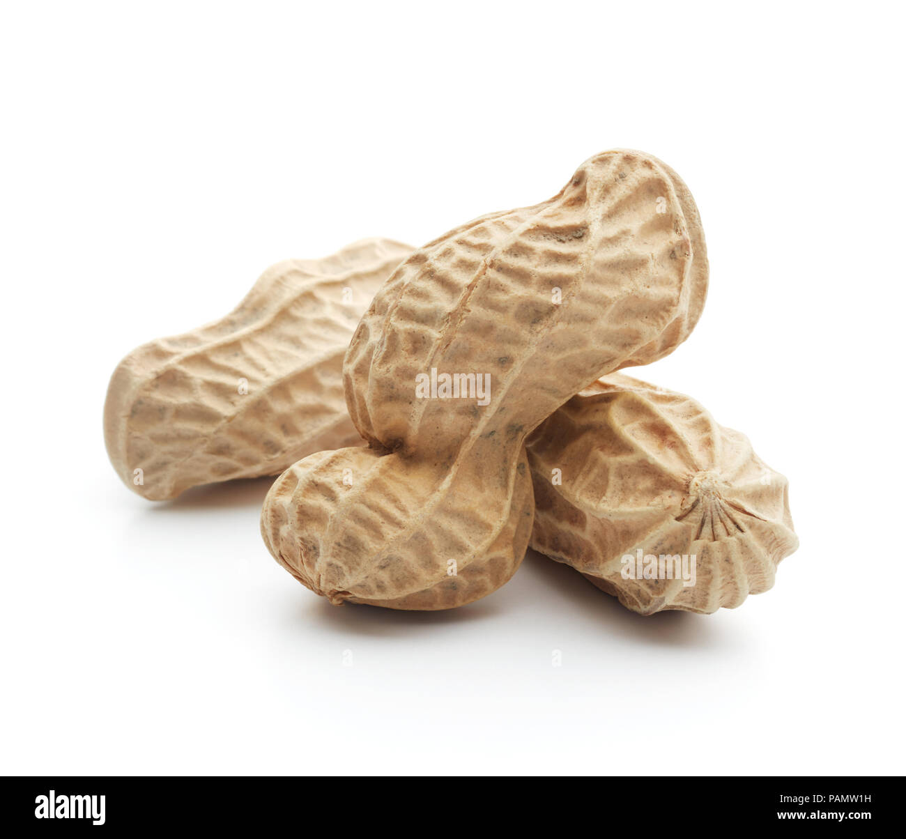 small pile of peanuts isolated on white Stock Photo - Alamy