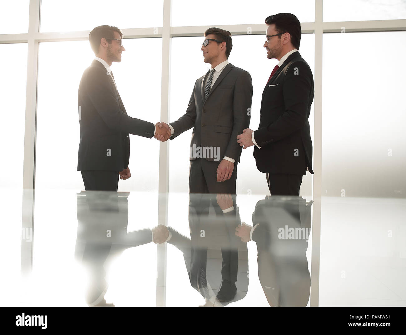 reliable handshake of business partners Stock Photo - Alamy