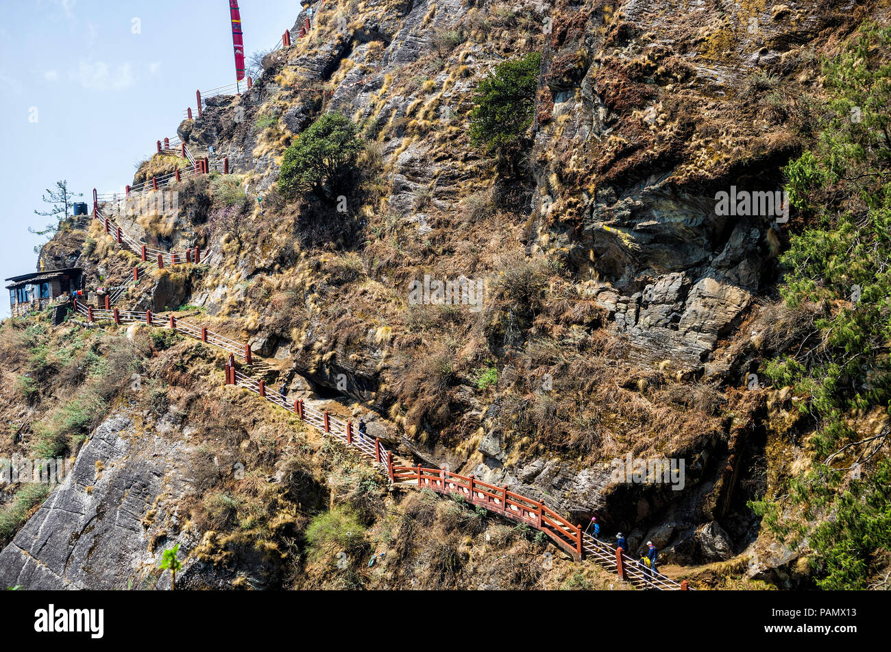 The narrow steep staircases path leading to the Tiger's Nest, Taktshang ...