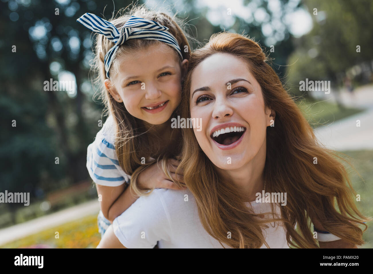 Cute little preschool girl without teeth smiling broadly Stock Photo ...