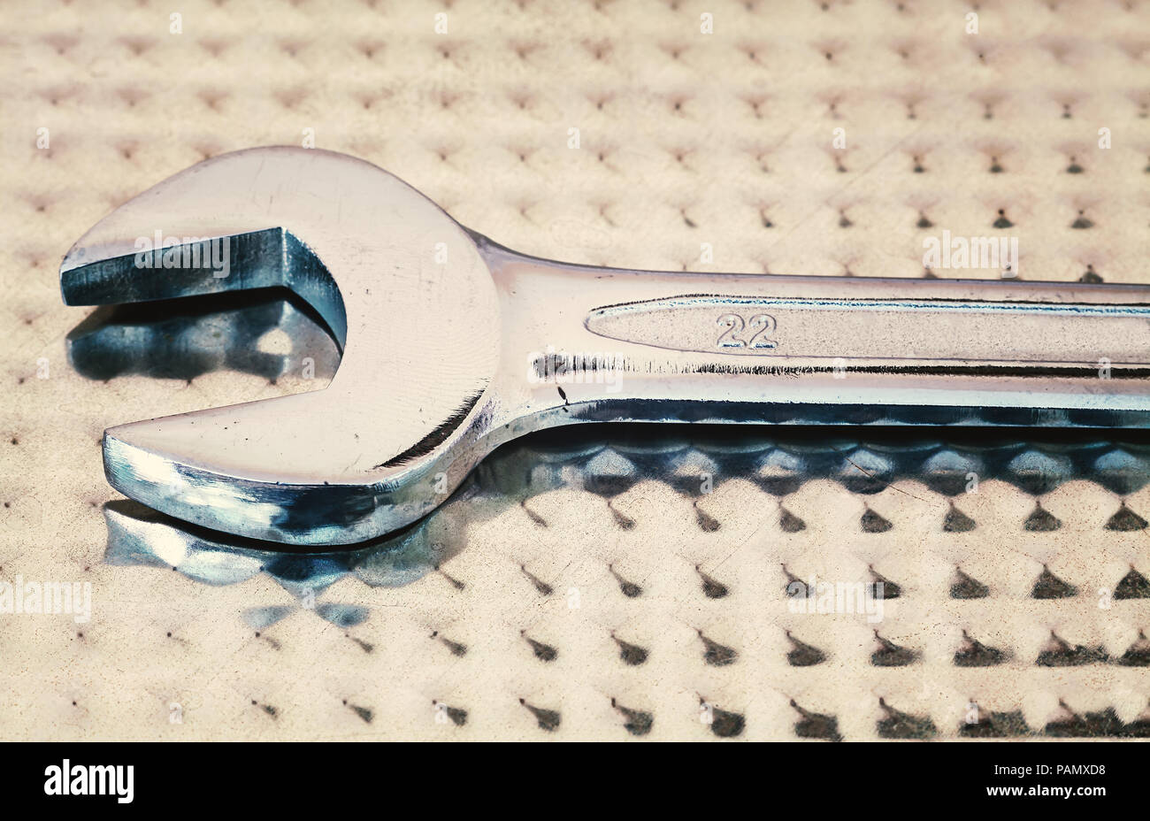 Abstract composition of metal wrench and surface Stock Photo - Alamy