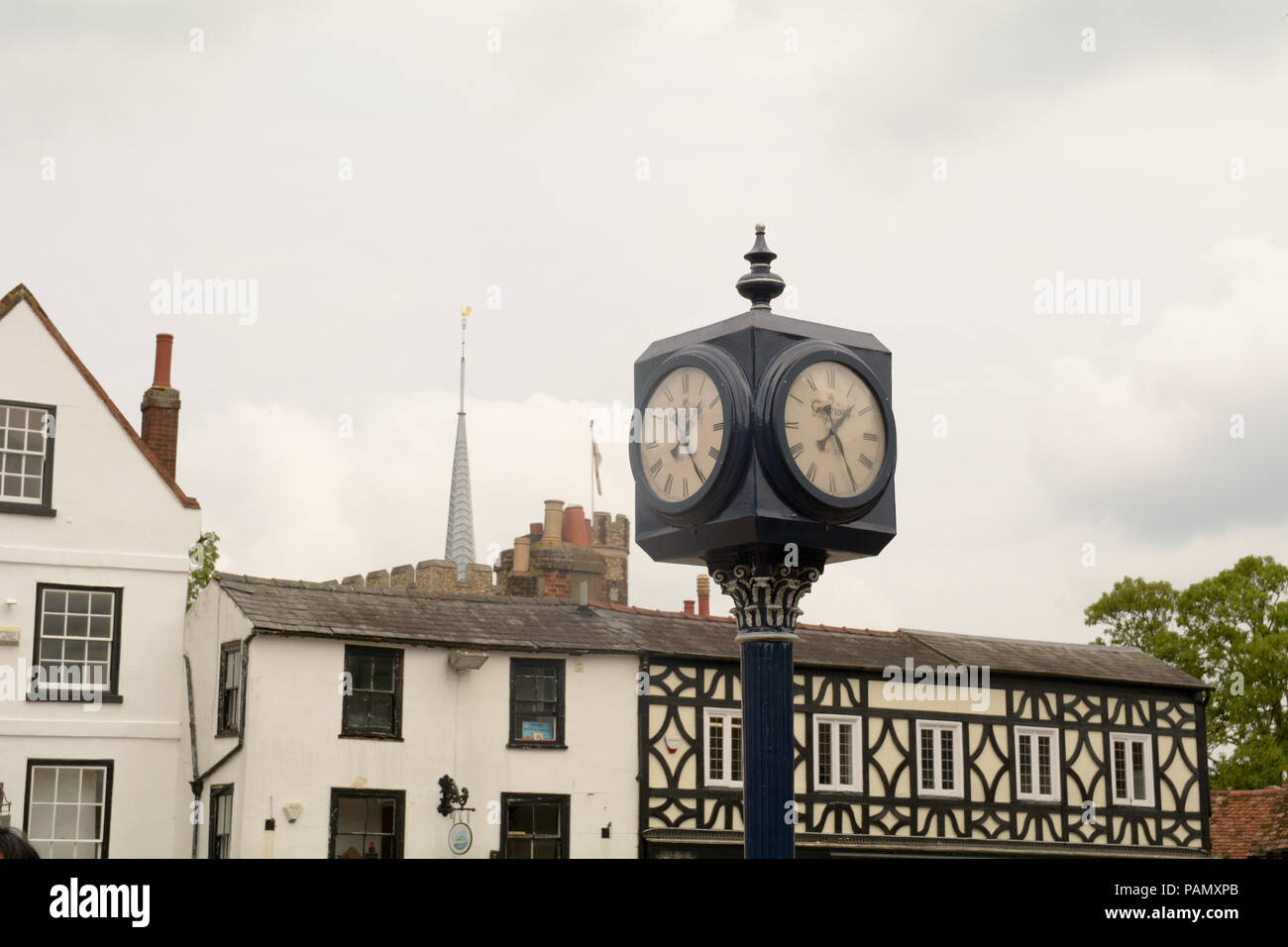 Clock in the Market Square Hitchin with St Marys church in the ...