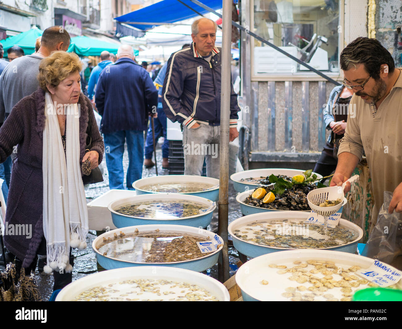 Molluscs for sale at a food market on a side street near Naples train ...
