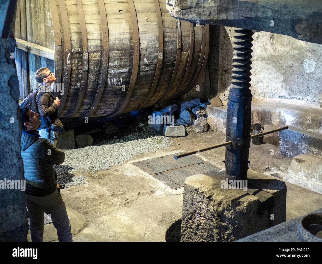 An old wooden wine press at Grazi Wines, one of the new generation of ...