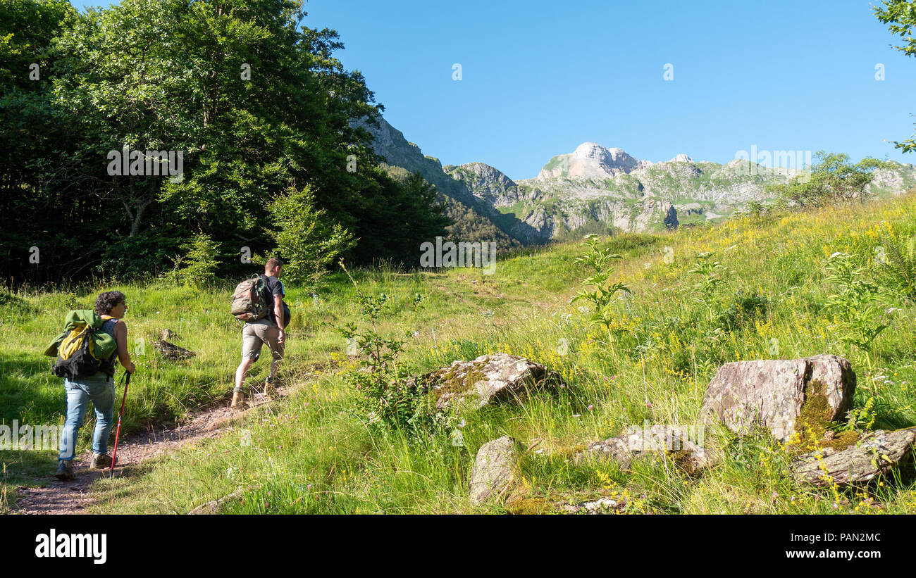 Two hikers walking in the Pyrenees mountains Stock Photo - Alamy