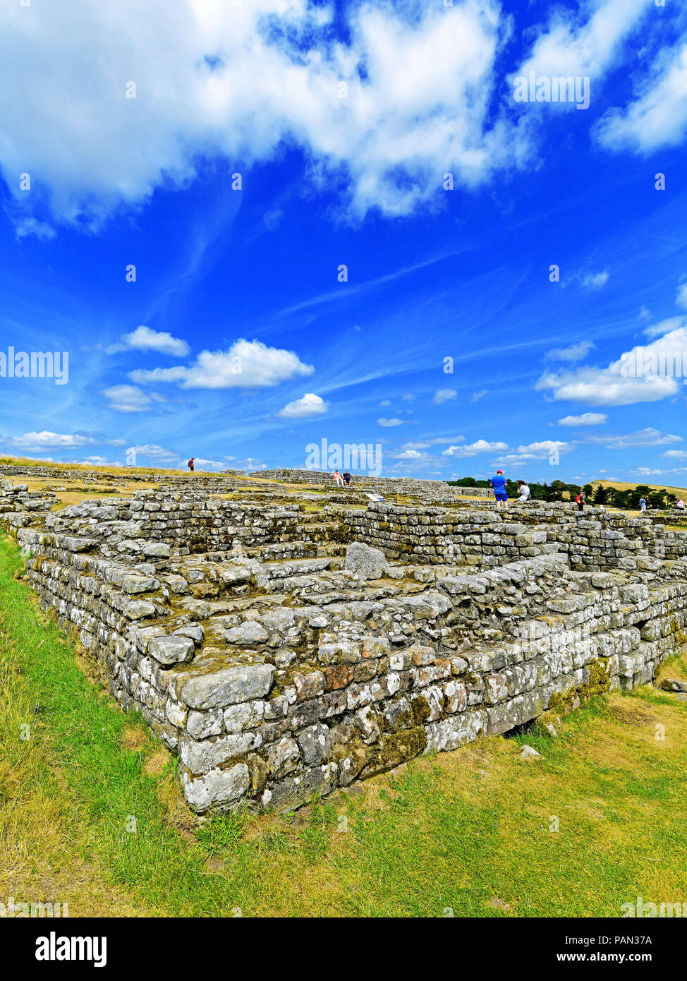 Housesteads Roman Fort corner living quarters with blue sky and white ...