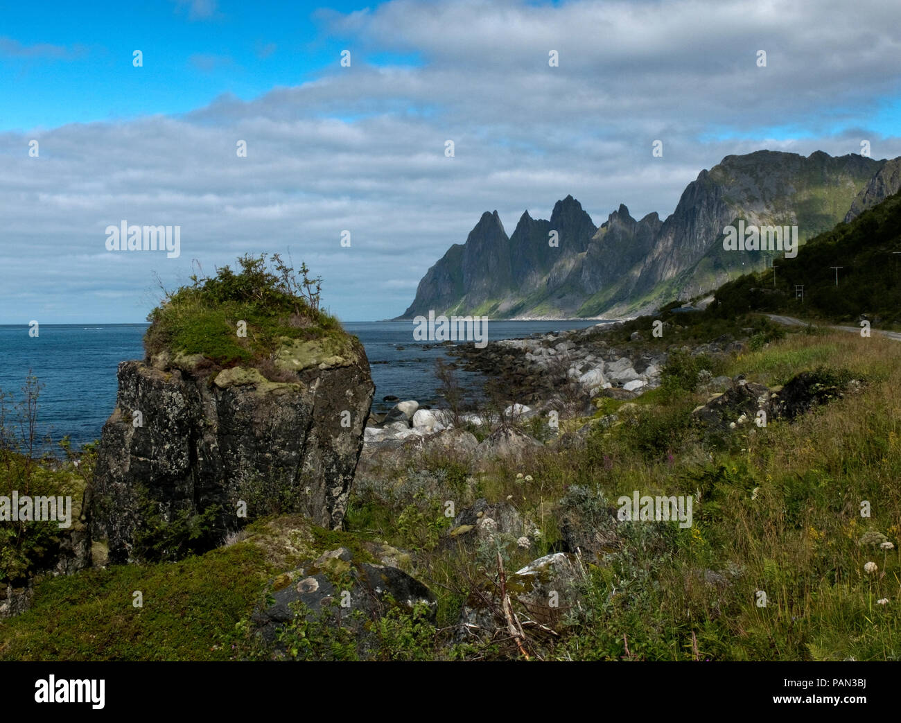 Landscape with distant peaks, Senja island, Norway Stock Photo - Alamy
