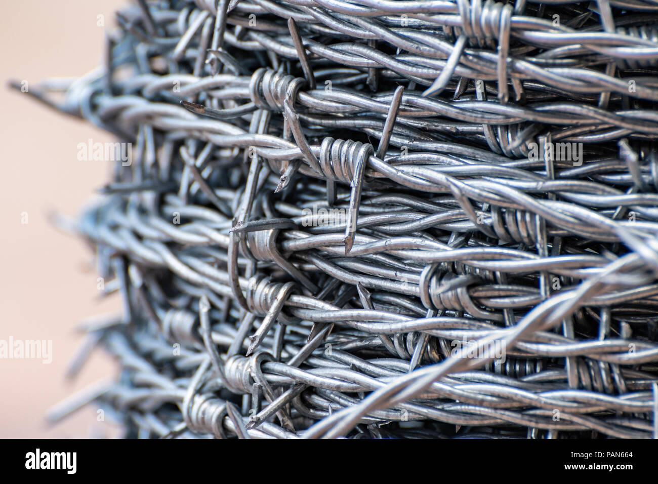 Shiny barbed wire hi-res stock photography and images - Alamy