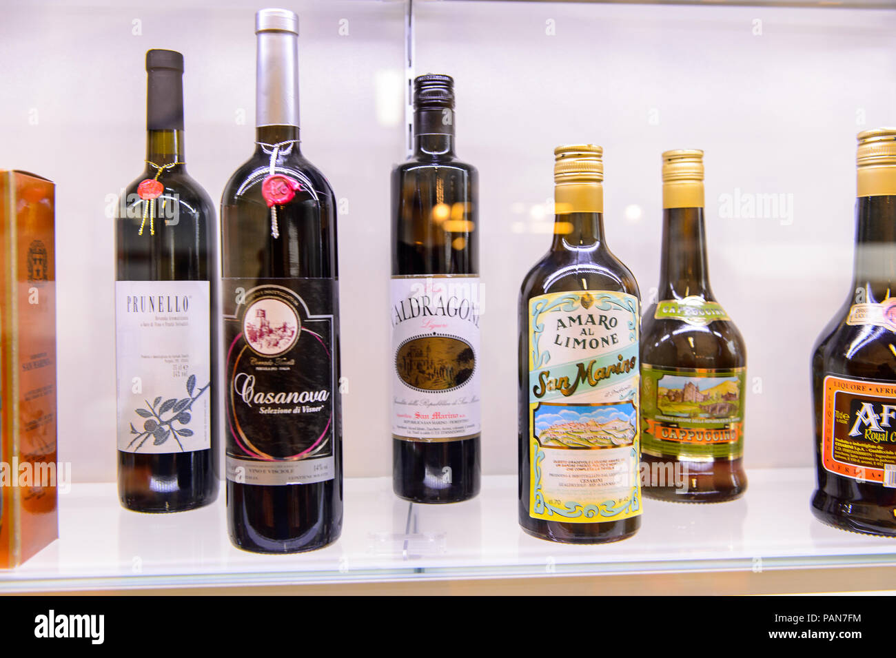 CITY OF SAN MARINO, SM - MAY 11, 2016: Bottles on the shelves of the ...