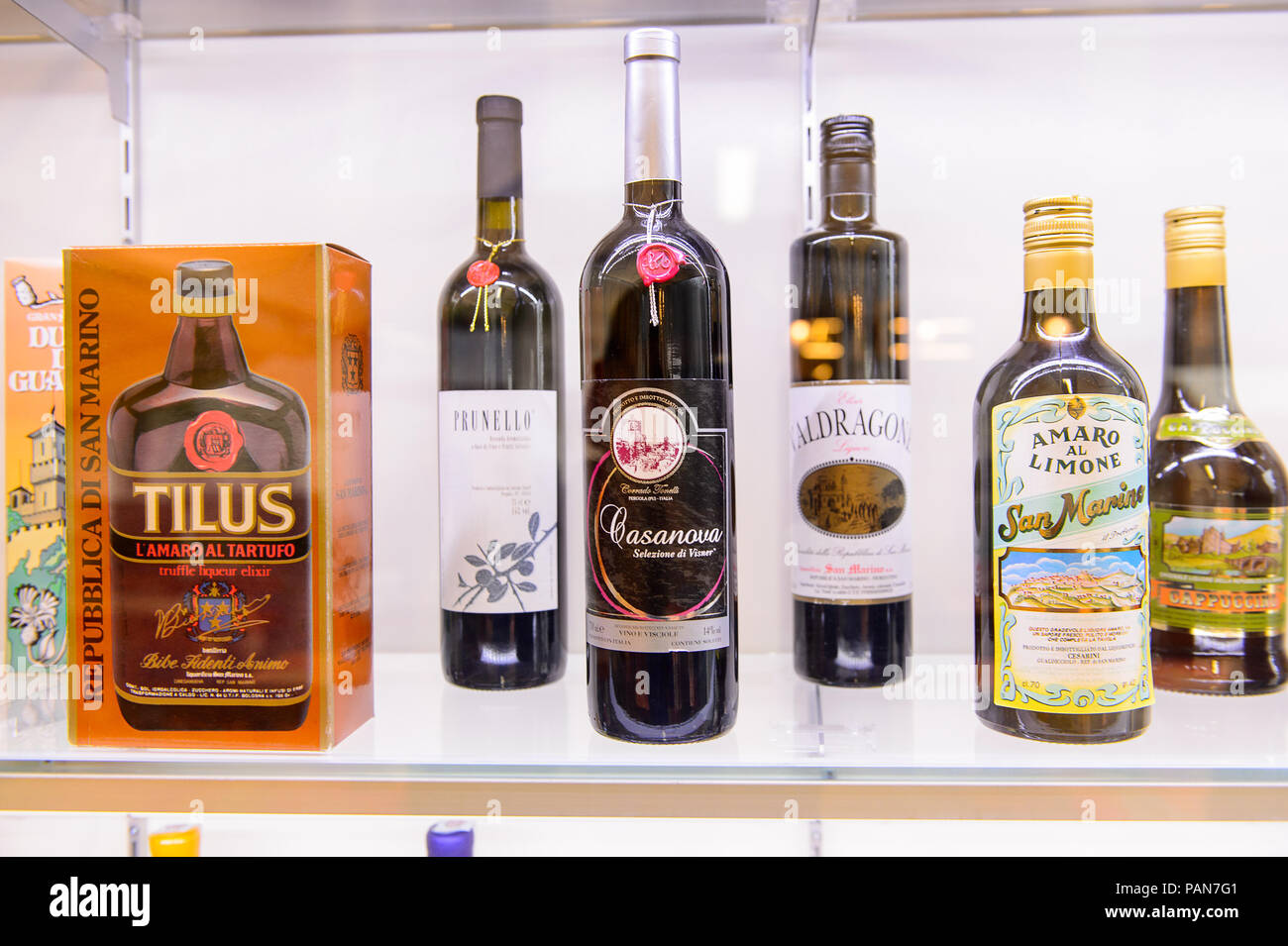 CITY OF SAN MARINO, SM - MAY 11, 2016: Bottles on the shelves of the ...