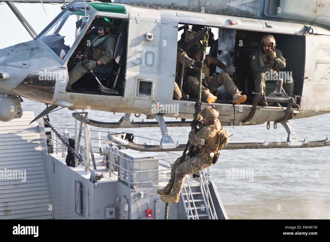 A Recon Marine with the Maritime Raid Force, 22nd Marine Expeditionary ...