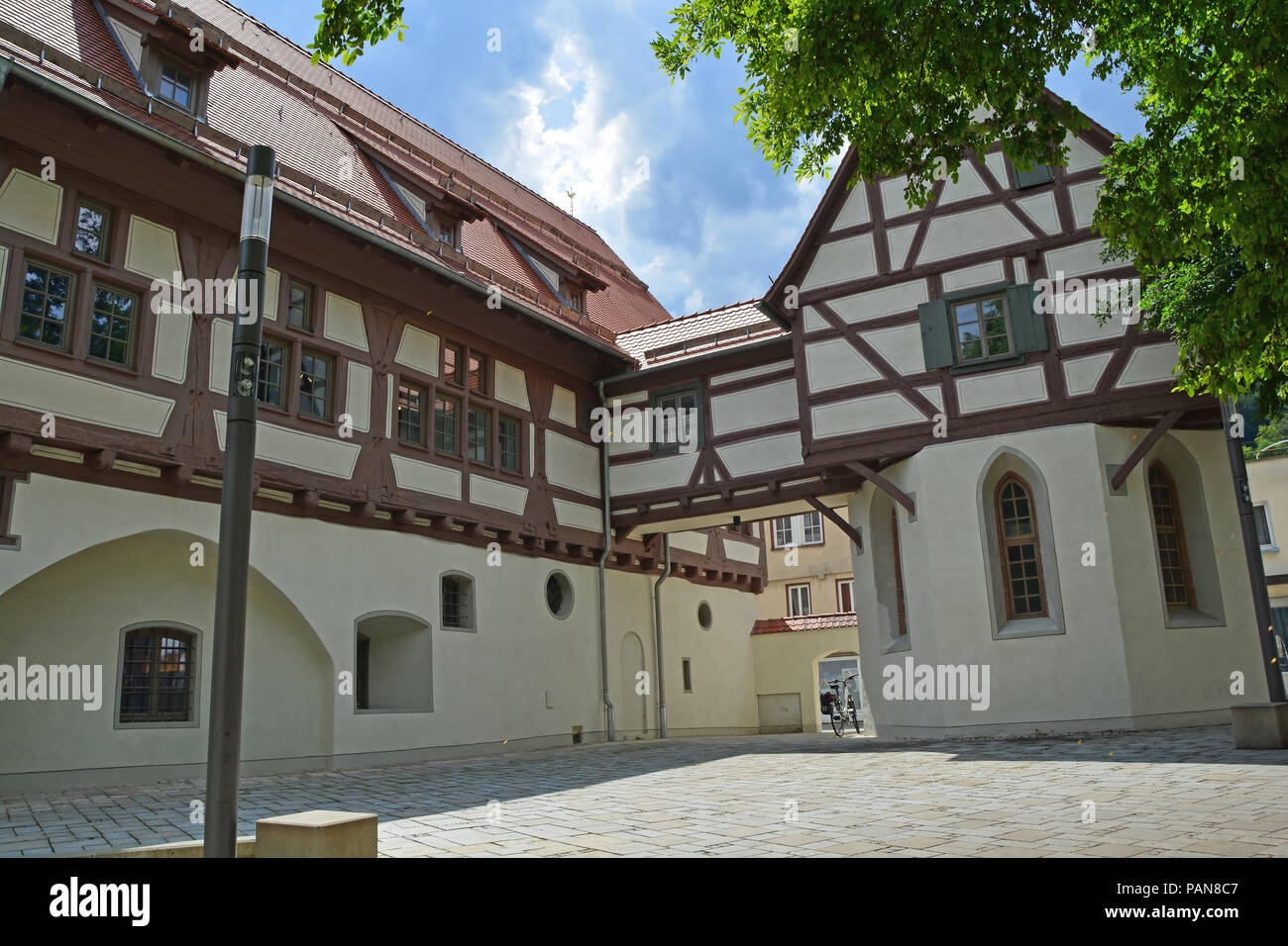 German half timbered building in medieval town with cobbled streets in ...