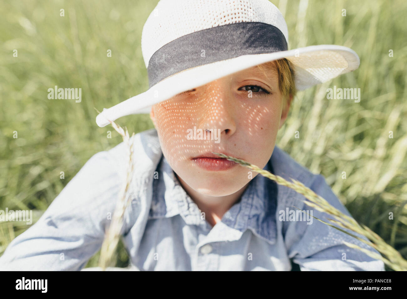 Boy wearing a hat hi-res stock photography and images - Alamy