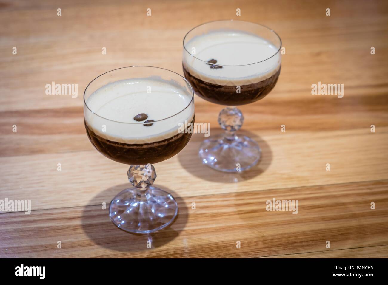 Two espresso martini cocktail drinks with coffee beans on top Stock ...