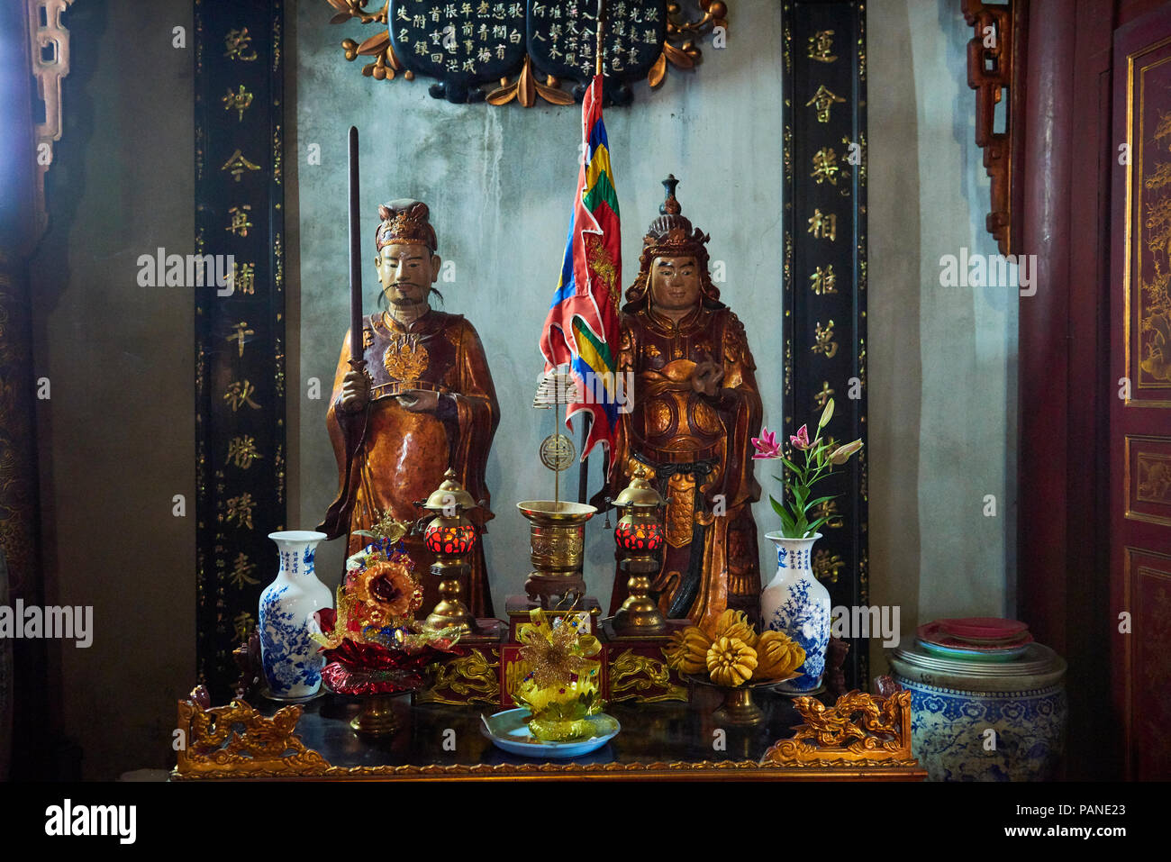 Two statues of Taoist deities inside Quan Thanh Temple in Hanoi ...