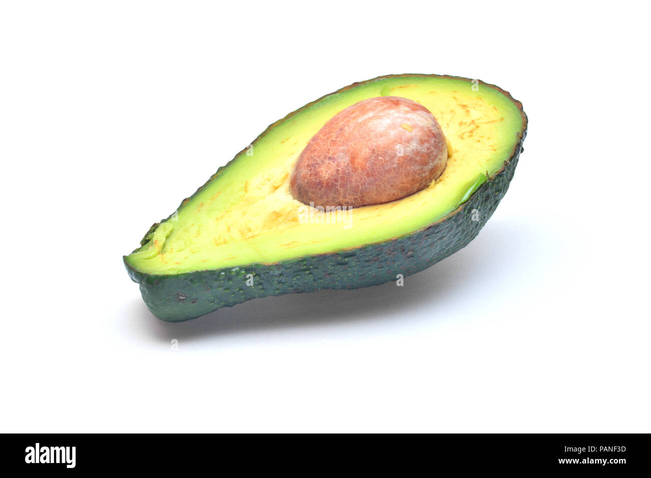 cross section of an avocado fruit isolated on white Stock Photo - Alamy