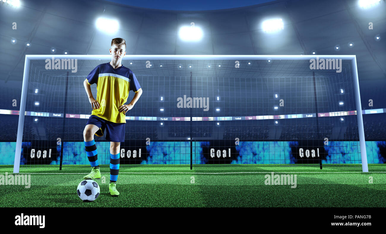 Young soccer player with ball in front of the goal on a professional 3D ...