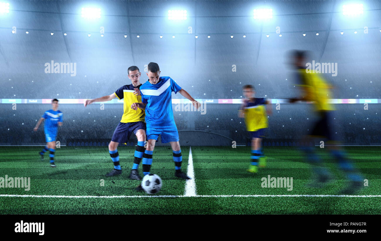 Young soccer players in action on the soccer stadium. Crowd and stadium ...