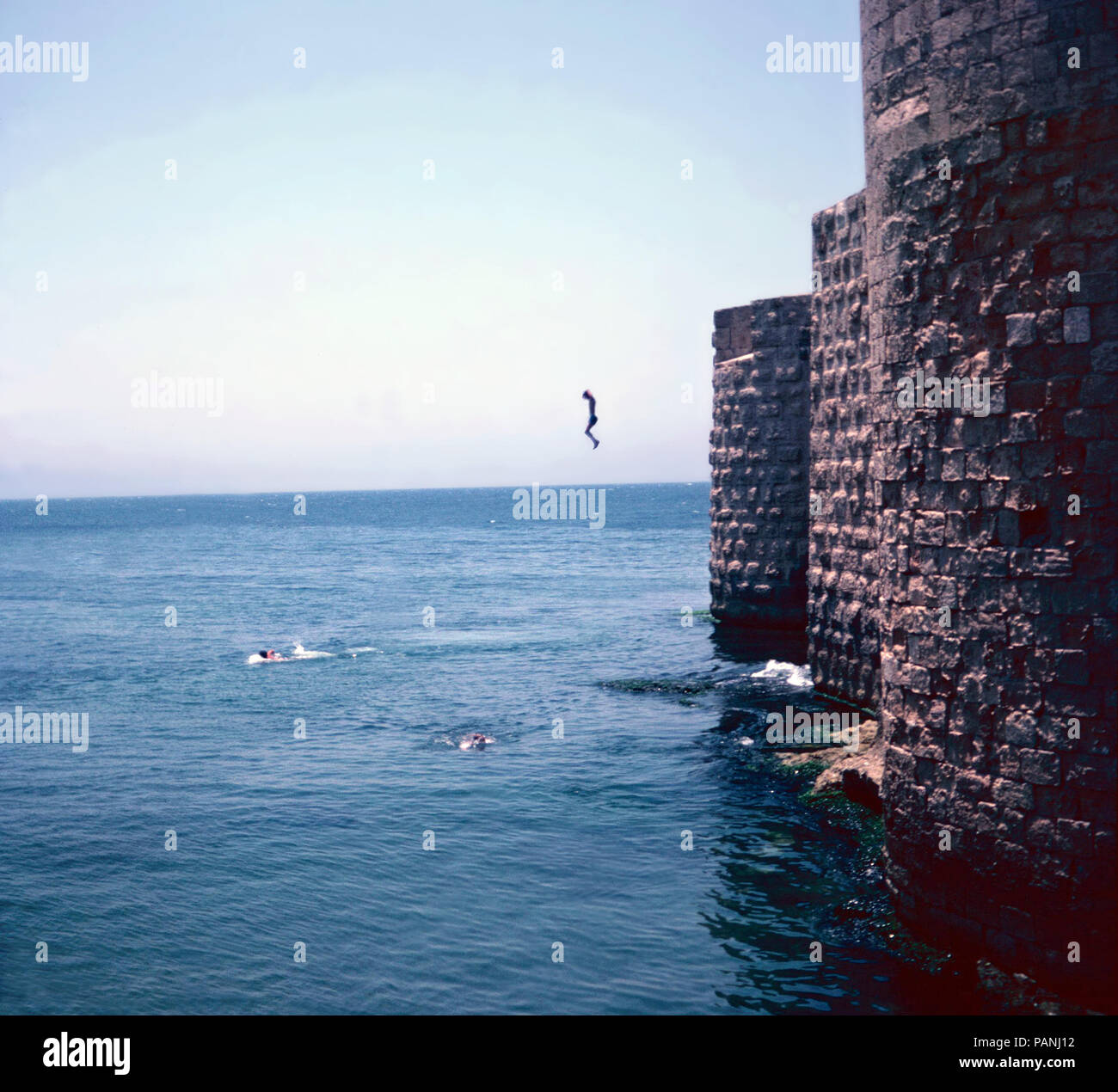 Diving from Crusader walls,Acre,Isreal Stock Photo - Alamy