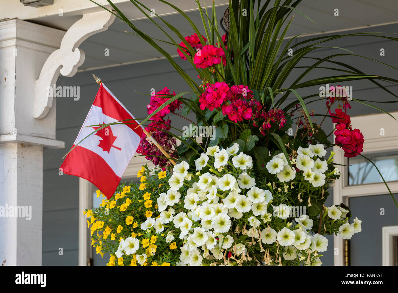 Closeup of building with flowers and Canadian flags Stock Photo - Alamy