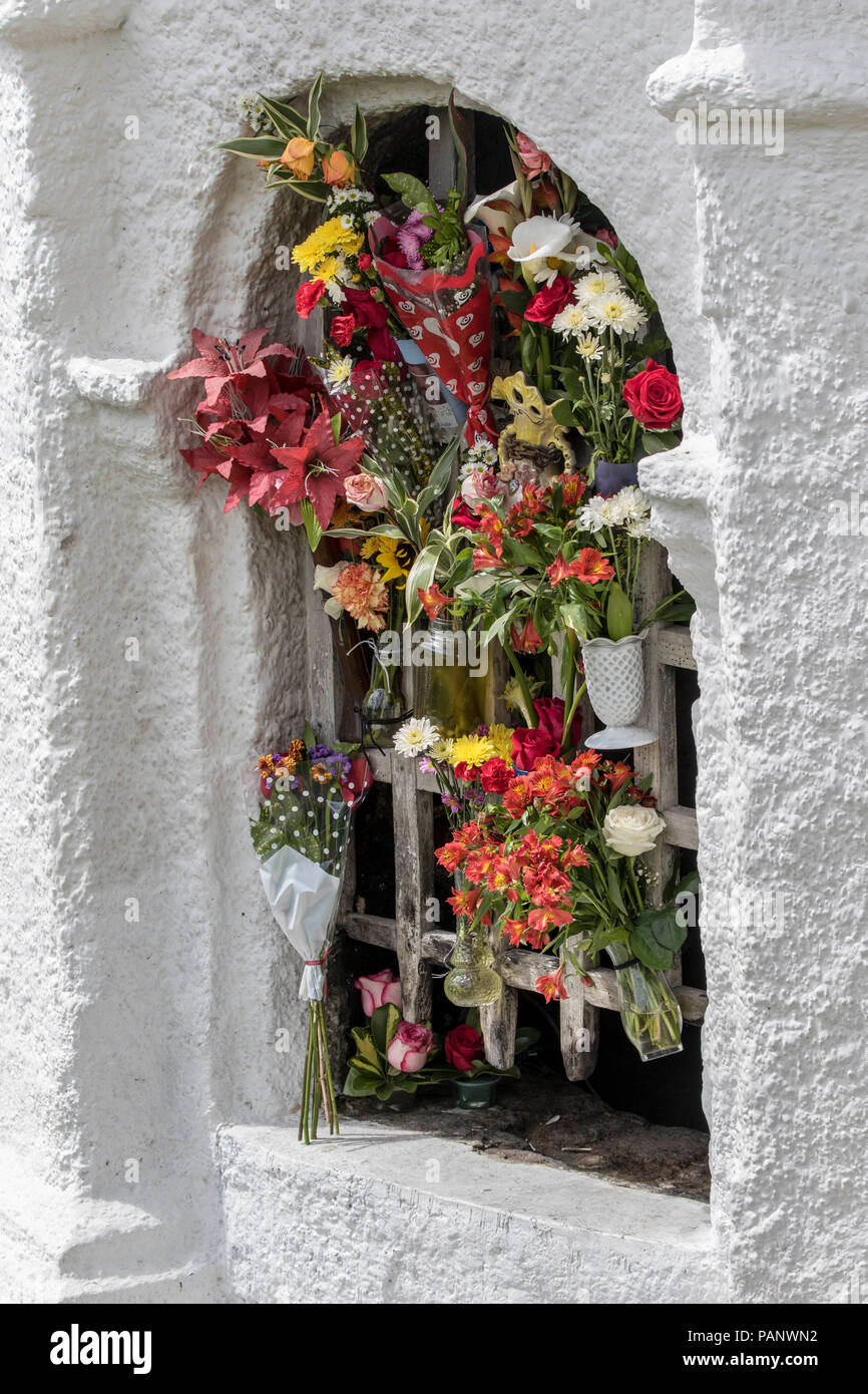 Outdoor family crypt in a cemetery in Cuenca Ecuador Stock Photo - Alamy