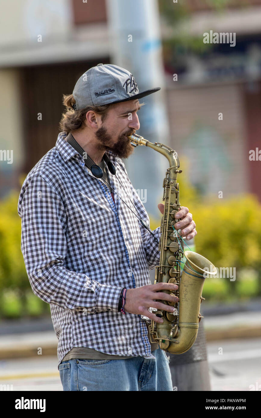 Man playing the saxaphone hi-res stock photography and images - Alamy