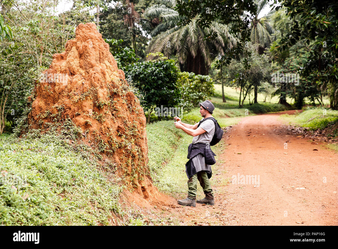 Uganda, Entebbe Botanic Gardens, Tourist taking pictures of Stock Photo ...