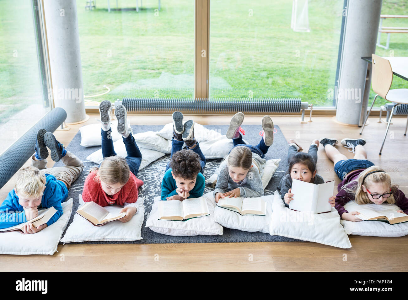 High school girl lying down hi-res stock photography and images - Alamy