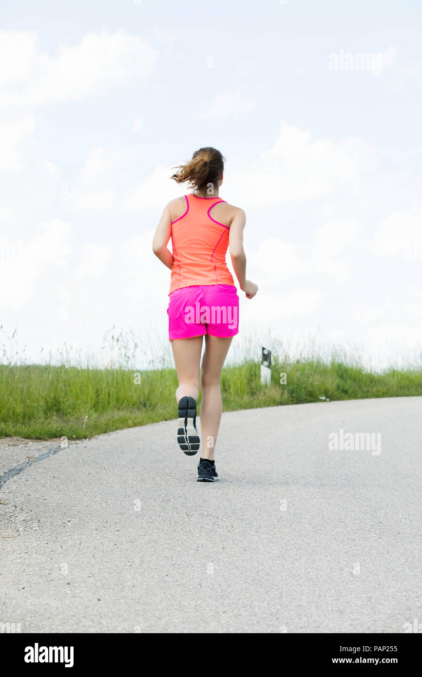 Woman training jogging free hi-res stock photography and images - Alamy