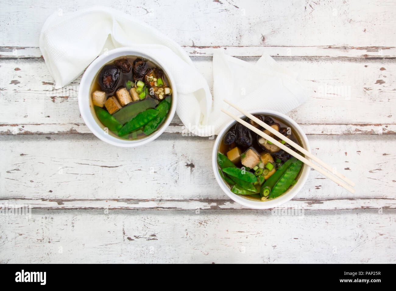 Japanese miso soup, sugar peas, shitake, tofu and mung sprouts Stock ...