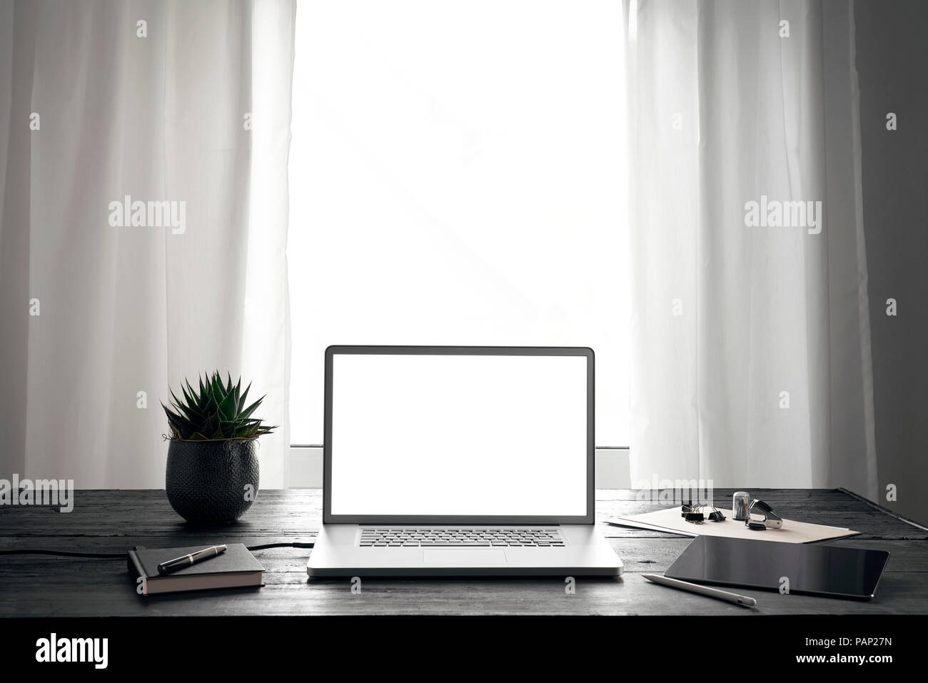 Modern office with laptop and digital tablet on desk Stock Photo - Alamy